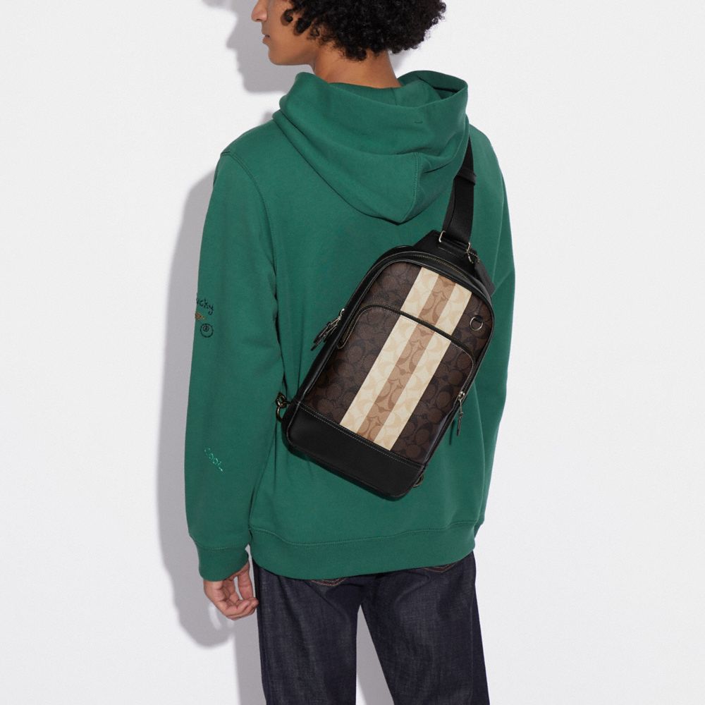 COACH® Outlet | Graham Pack In Blocked Signature Canvas With Varsity Stripe